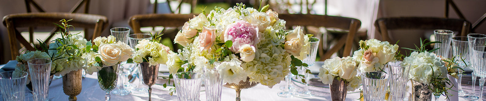 Wedding centerpieces from Divine Floral & Gifts.–Divine Floral & Gifts